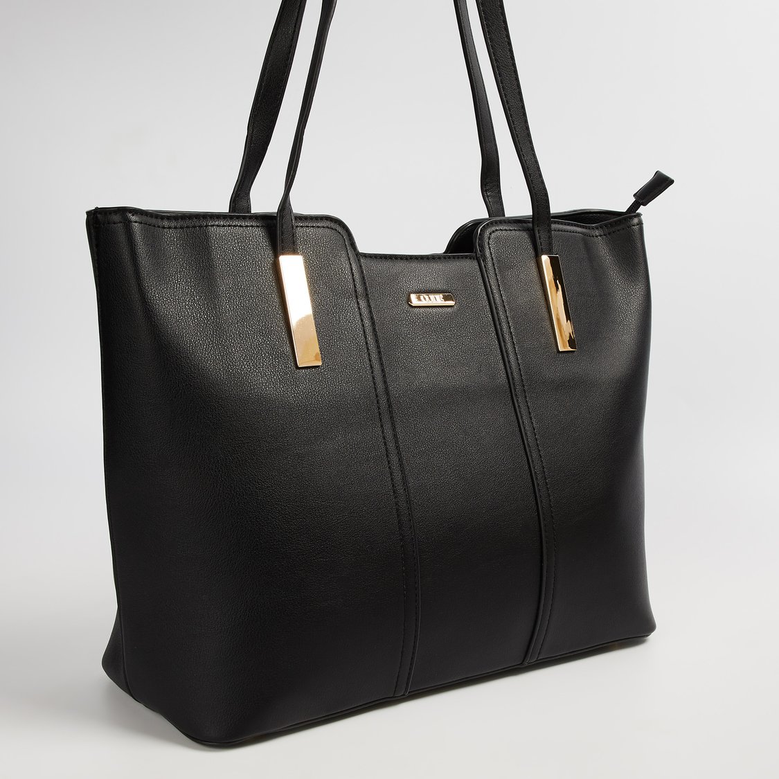 Buy CODE Solid Shoulder Bag from CODE at just INR 1699.0