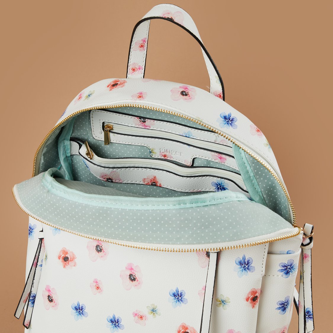 Buy GINGER Floral Print Backpack from Ginger at just INR 2299.0