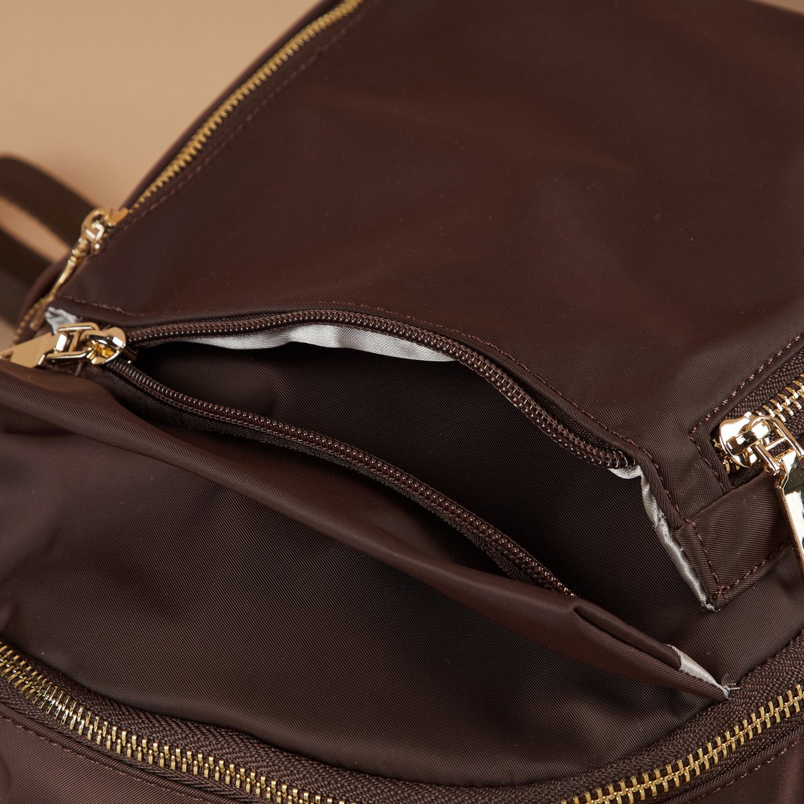 Buy GINGER Women Solid Backpack from Ginger at just INR 2299.0