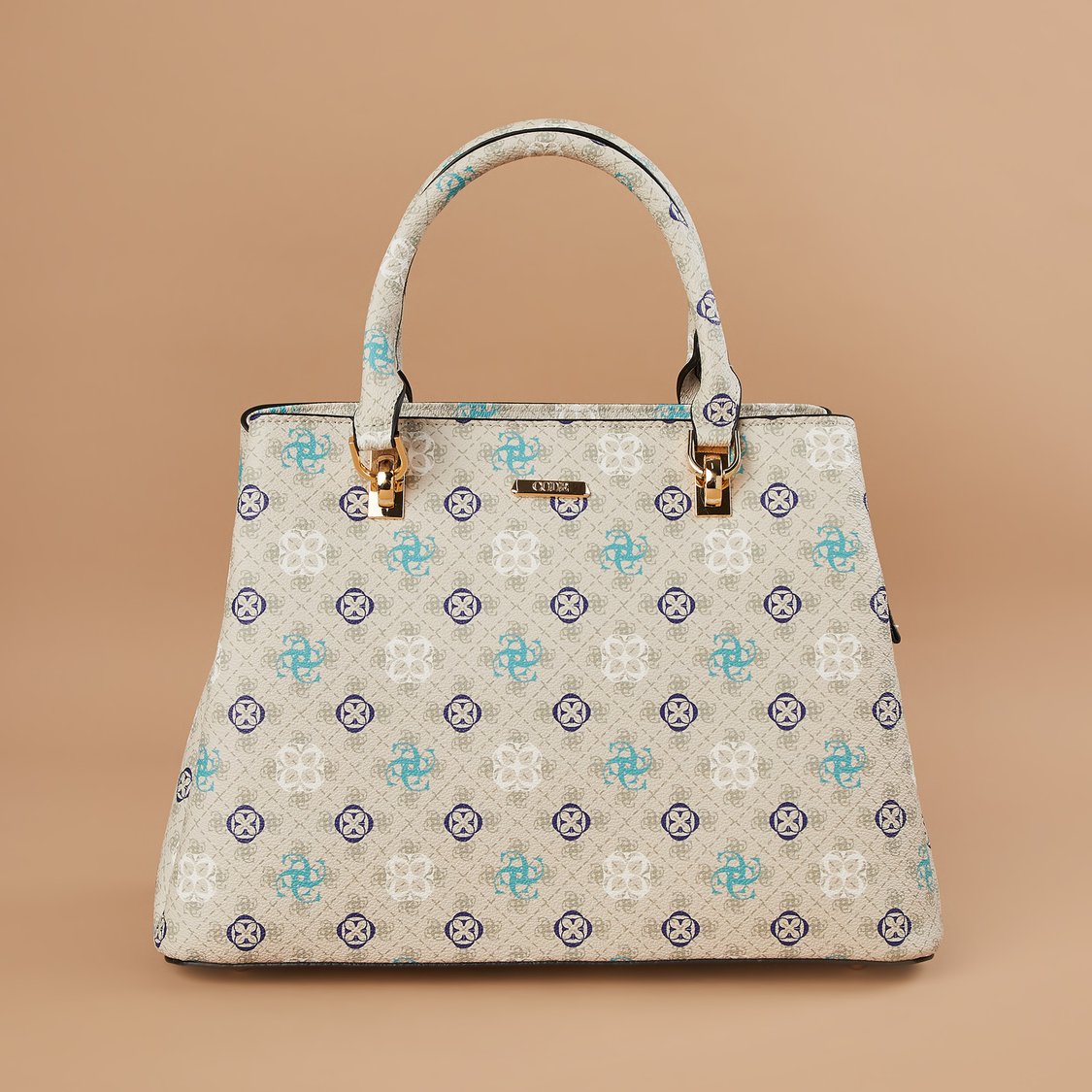 Buy CODE Monogram Print Handheld Bag from CODE at just INR 2899.0