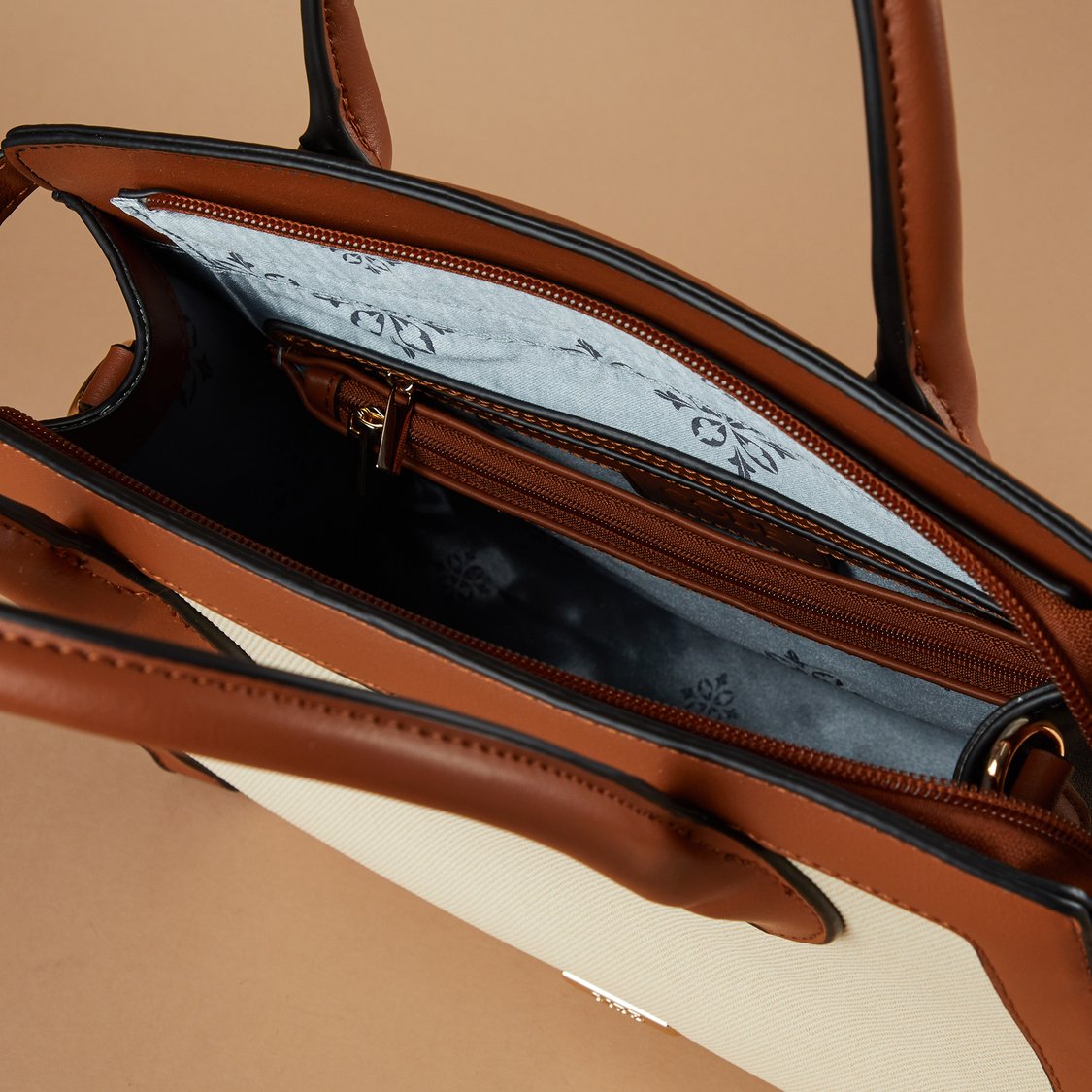 Buy CODE Colourblock Handheld Bag from CODE at just INR 2899.0