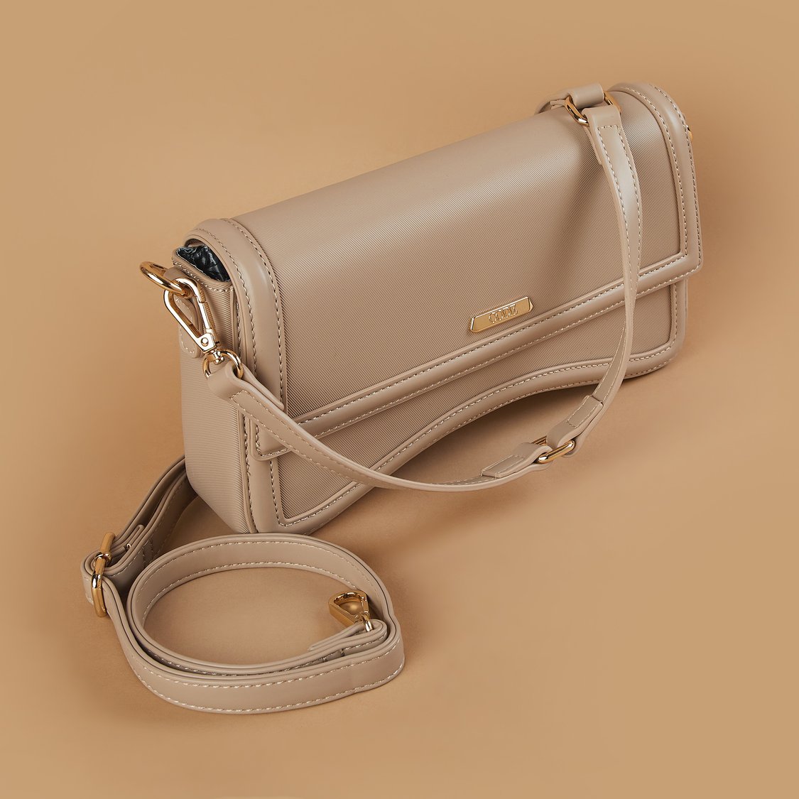 Buy CODE Textured Sling Bag from CODE at just INR 2299.0