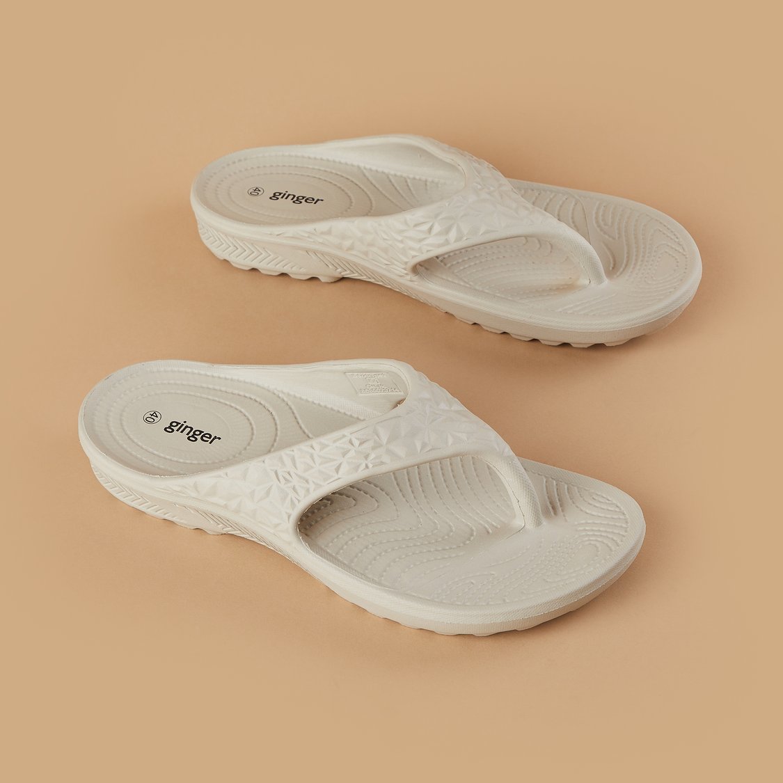 Buy GINGER Textured Flip Flops from Ginger at just INR 499.0