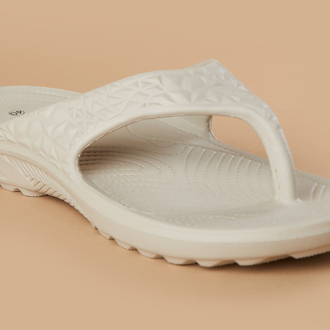 Buy GINGER Textured Flip Flops from Ginger at just INR 499.0