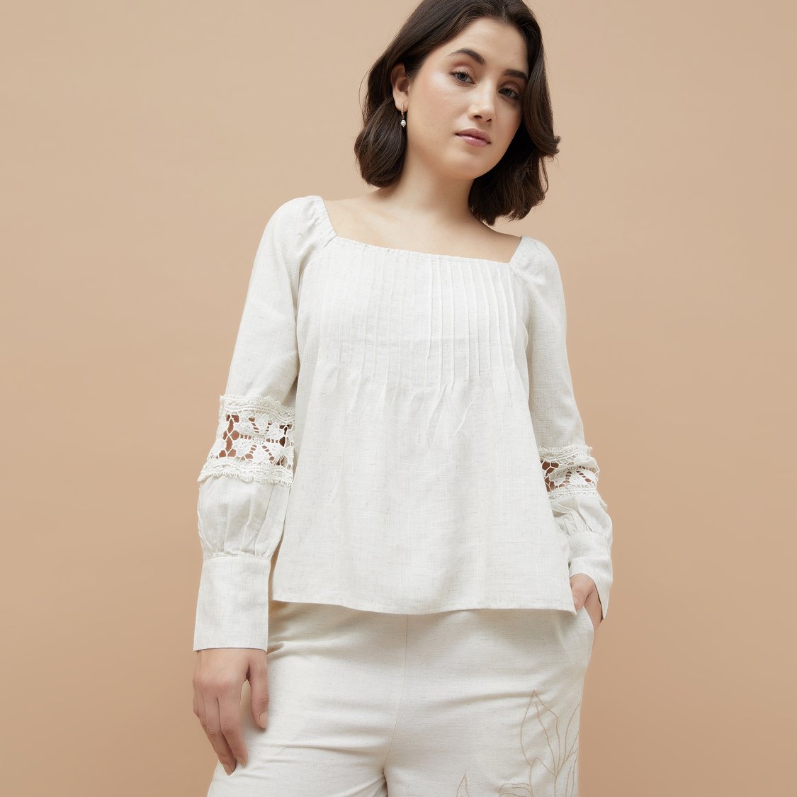 Buy CODE Lace Inset Bishop Sleeve Top from CODE at just INR 1799.0