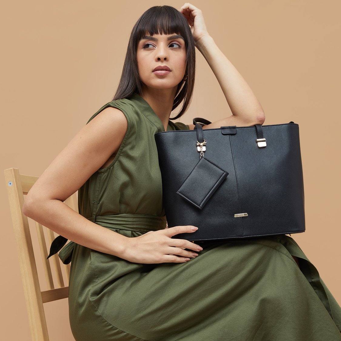 Buy CODE Textured Shoulder Bag with Wallet from CODE at just INR 2499.0