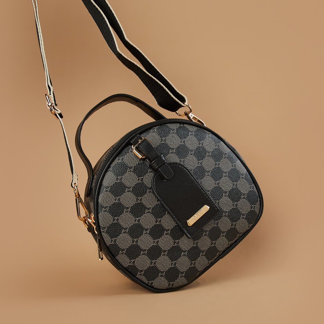 Buy CODE Patterned Sling Bag from CODE at just INR 1499.0