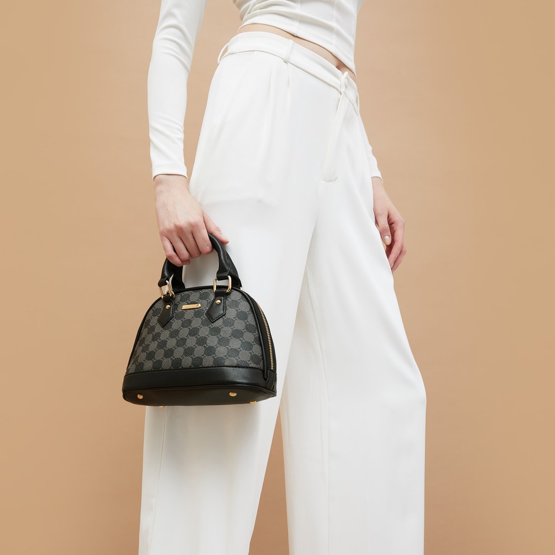 Buy CODE Patterned Handheld Bag from CODE at just INR 1699.0