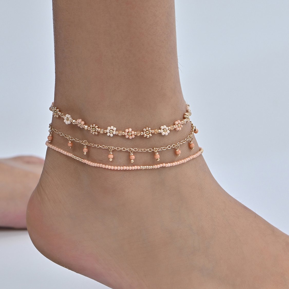 Buy TONIQ Assorted Beaded Anklet - Pack of 3 from Toniq at just INR 499.0