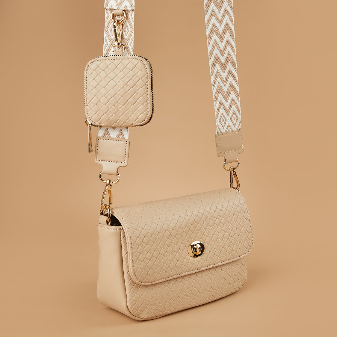 Buy CODE Patterned Sling Bag with Pouch from CODE at just INR 1699.0