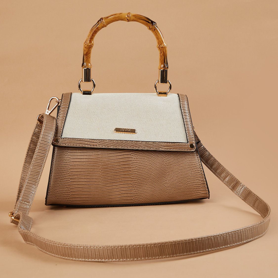 Buy Code Textured Sling Bag From Code At Just Inr 2499 0