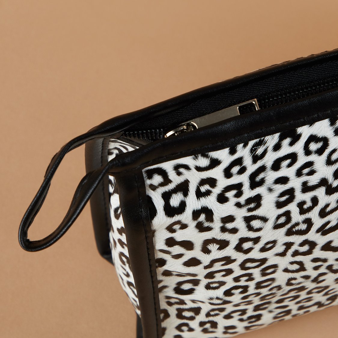 Buy GINGER Animal Print Pouch from Ginger at just INR 499.0