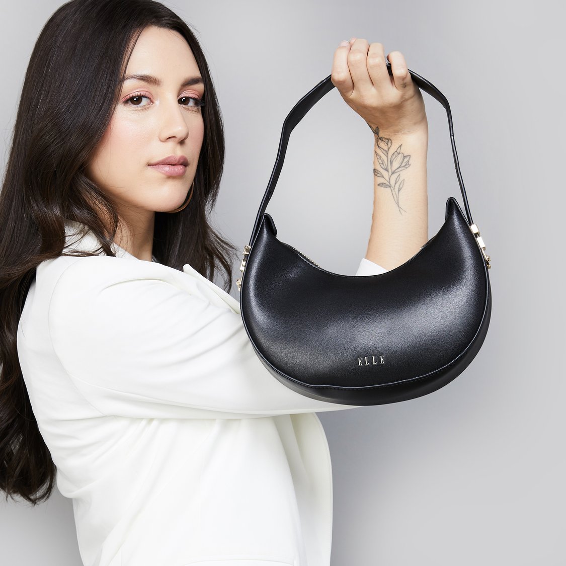 Buy ELLE Solid Baguette Bag from Elle at just INR 2999.0