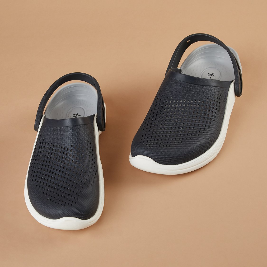 Buy FORCA Perforated Clogs from Forca at just INR 799.0