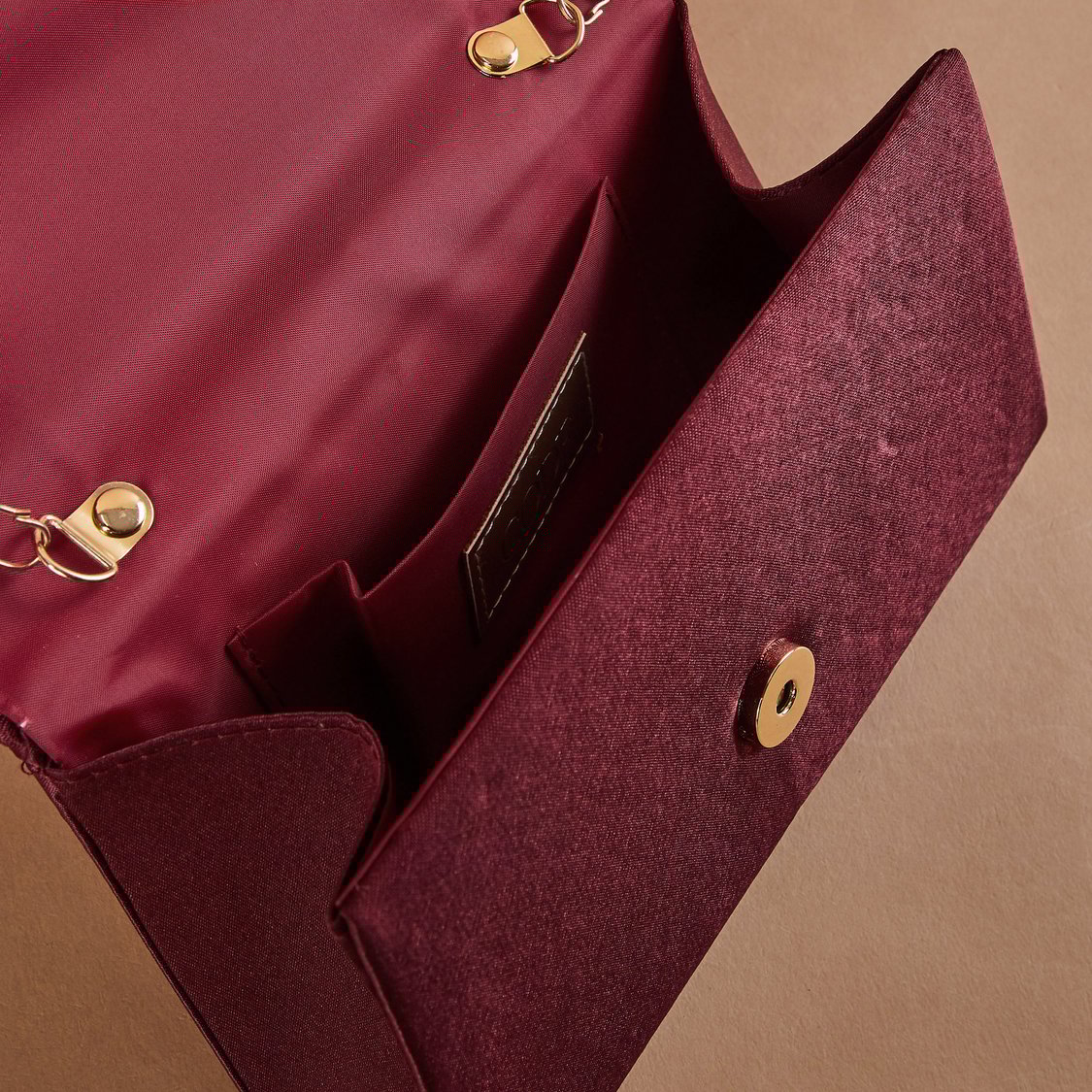 Buy CODE Applique Clutch with Pearl Handle from CODE at just INR 1299.0