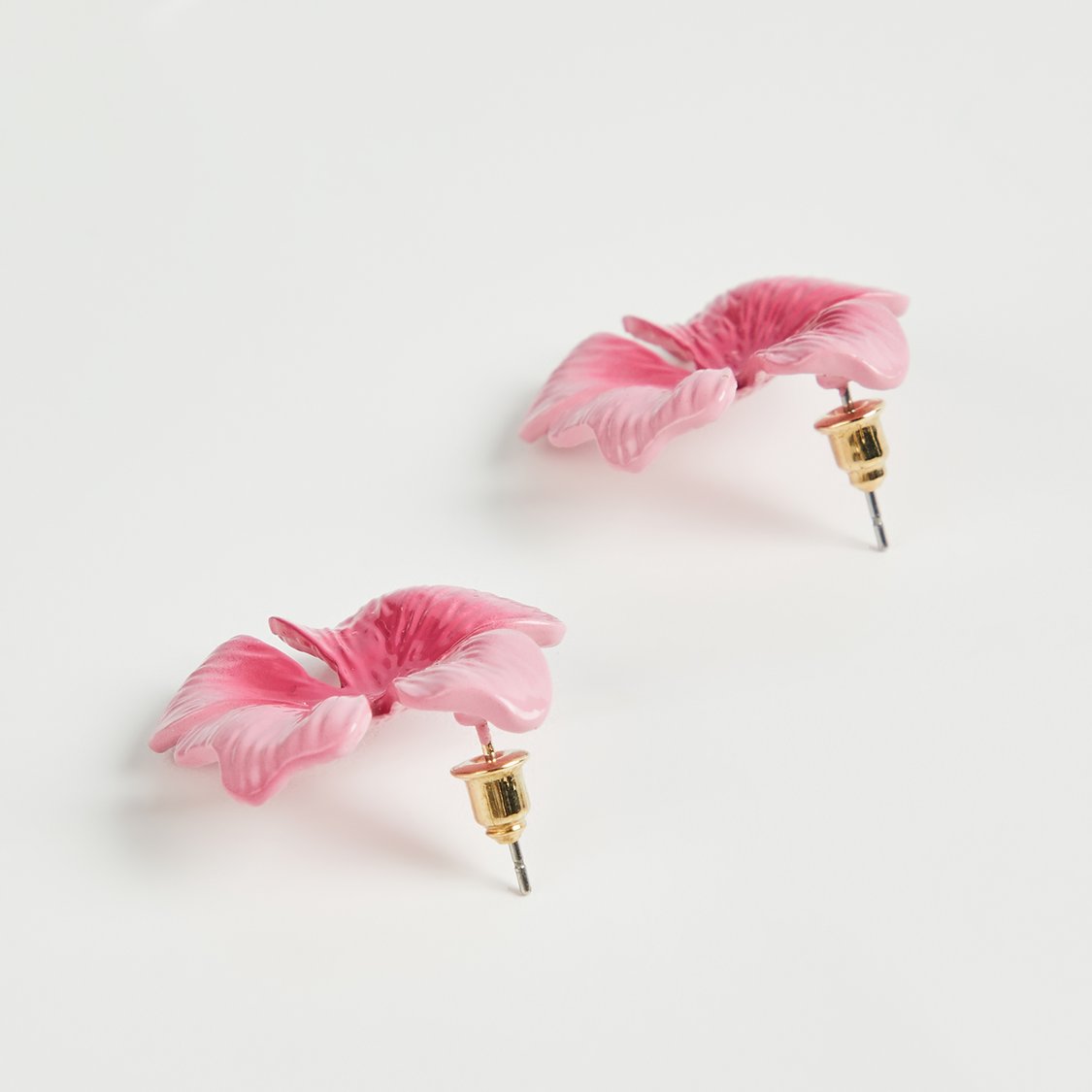 Buy GINGER Textured Floral Stud Earrings from Ginger at just INR 149.0