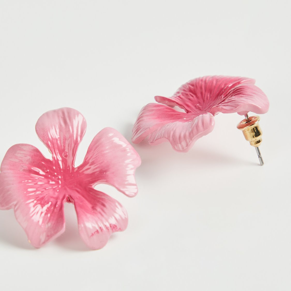 Buy GINGER Textured Floral Stud Earrings from Ginger at just INR 149.0