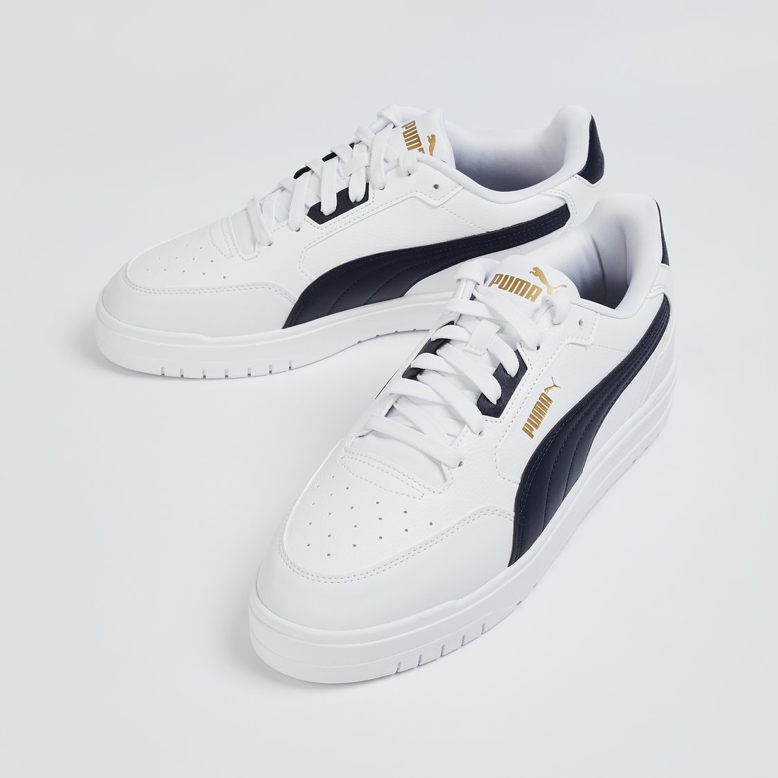 Buy PUMA Shuffle Downtown Sneakers from PUMA at just INR 4999.0