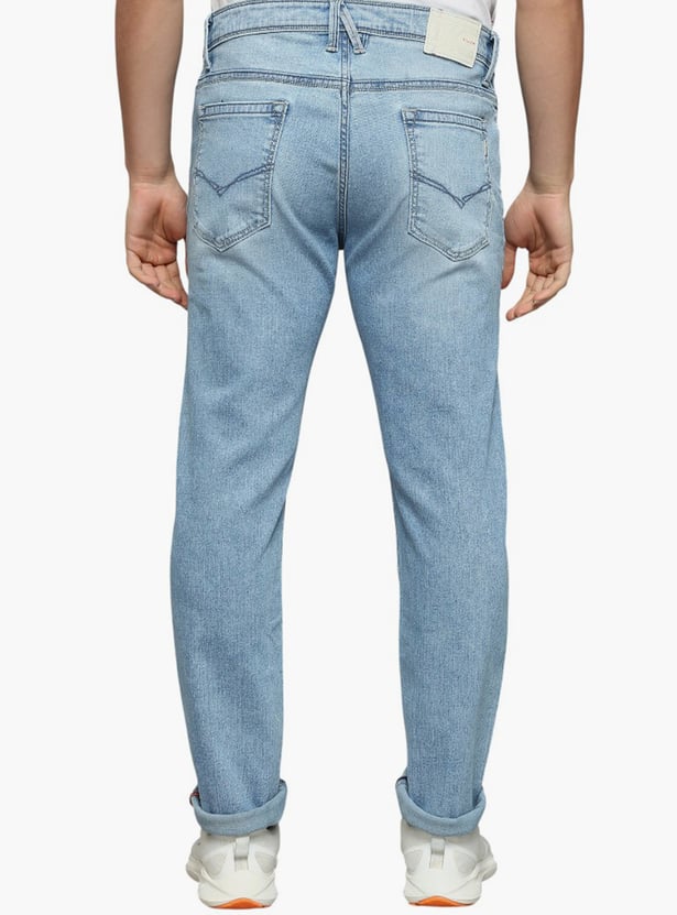 Buy KILLER Washed Slim Tapered Jeans from Killer at just INR 3299.0