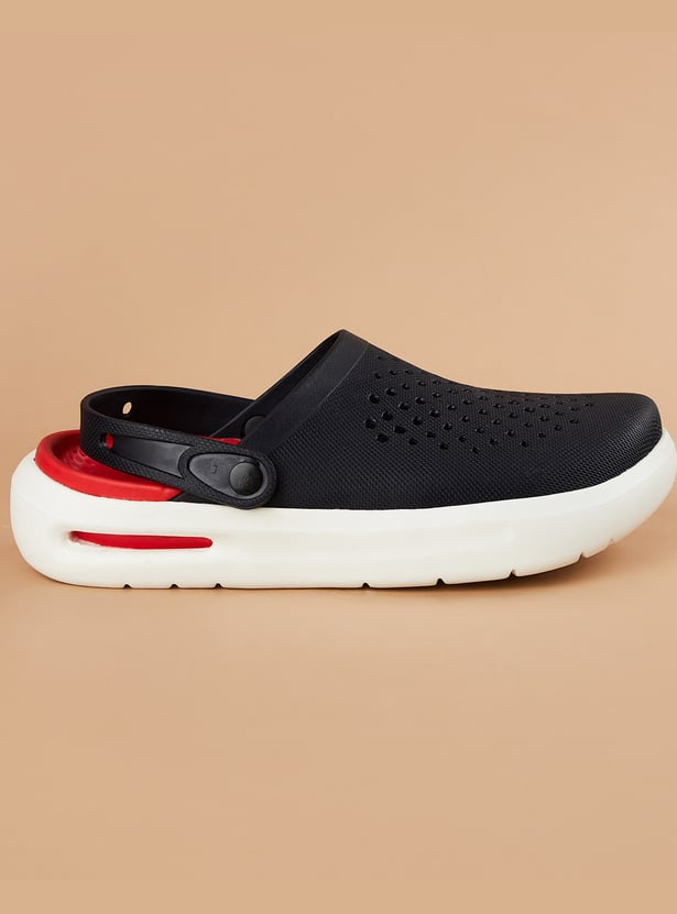 Buy FORCA Perforated Slip-On Clogs from Forca at just INR 799.0