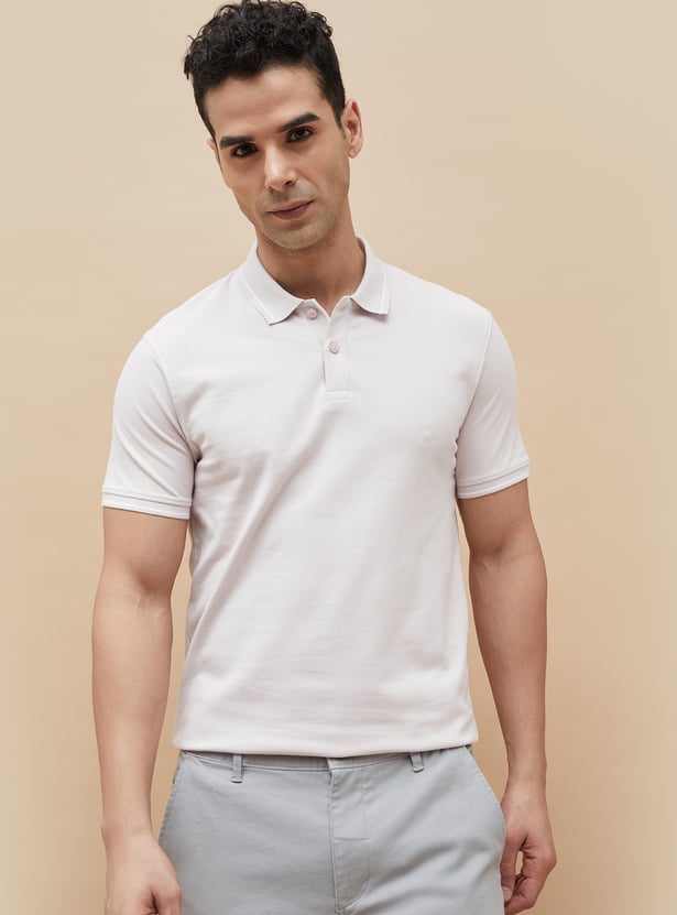 Buy CODE Solid Regular Fit Polo T-shirt from CODE at just INR 999.0