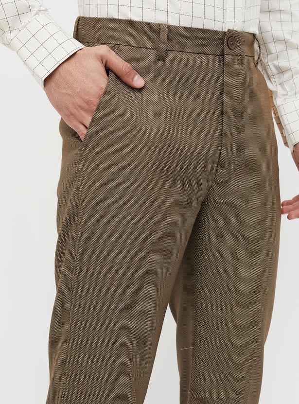 Buy CODE Men Solid Regular Fit Formal Trousers from CODE at just INR 999.0