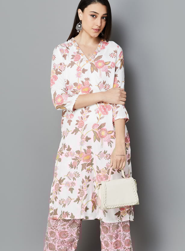 Buy MELANGE Women Floral Printed Straight Kurta Set from Melange at just INR 1599.0