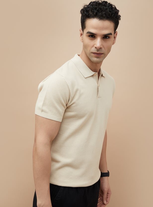Buy CODE Solid Knit Polo T-shirt from CODE at just INR 1499.0