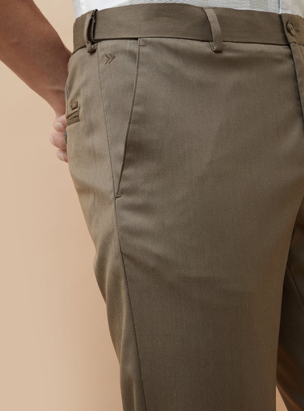 Buy CODE Solid Regular Fit Formal Trousers from CODE at just INR 1699.0