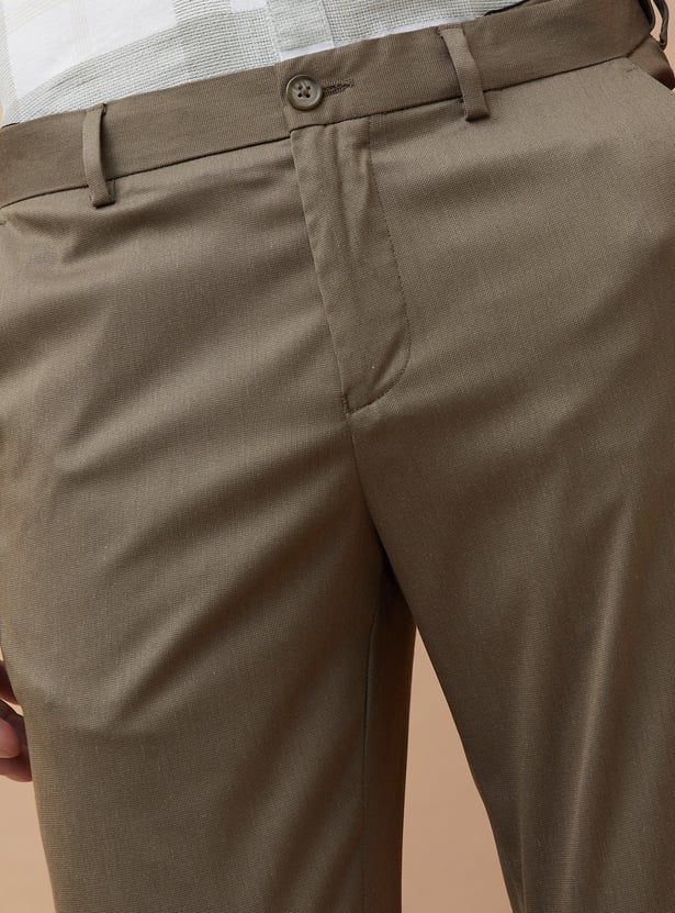 Buy CODE Solid Regular Fit Formal Trousers from CODE at just INR 1699.0