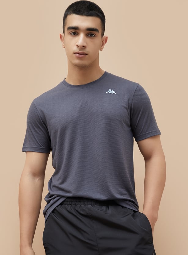 Buy KAPPA Solid Sports T-shirt from Kappa at just INR 799.0