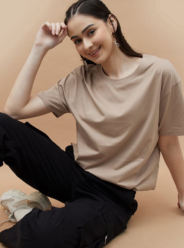 Buy FAME FOREVER Solid T-shirt from Fame Forever at just INR 299.0