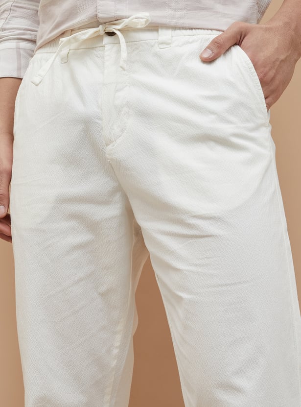 Buy CODE UNWIND Textured Regular Fit Trousers from Code Unwind at just ...