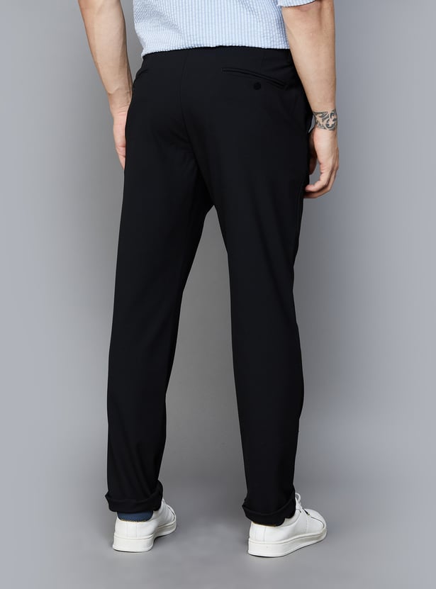 Buy RARE RABBIT Solid Regular Fit Trousers from Rare Rabbit at just INR ...