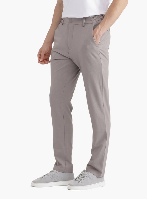 Buy RARE RABBIT Solid Regular Fit Trousers from Rare Rabbit at just INR ...