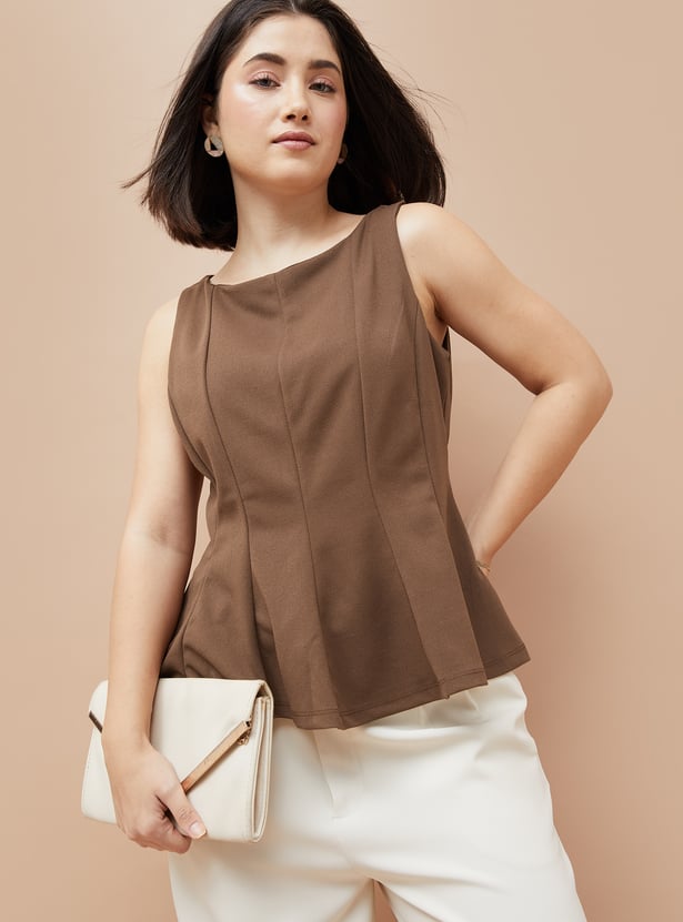 Buy CODE Solid Sleeveless Top from CODE at just INR 1299.0