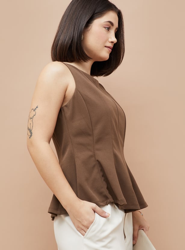 Buy CODE Solid Sleeveless Top from CODE at just INR 1299.0