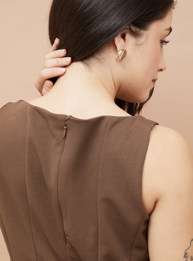 Buy CODE Solid Sleeveless Top from CODE at just INR 1299.0