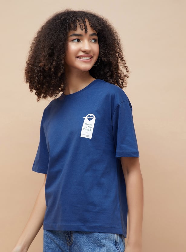 Buy FAME FOREVER Back Graphic Print Drop Shoulder T-shirt from Fame Forever at just INR 399.0