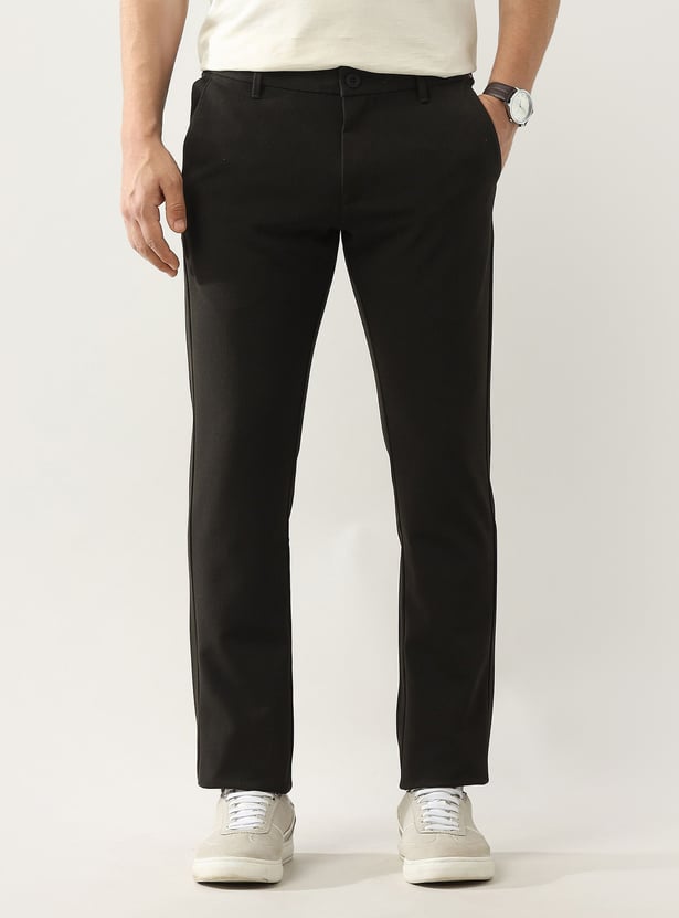 Buy ARROW SPORT Solid Slim Fit Trousers from Arrow Sport at just INR 2999.0