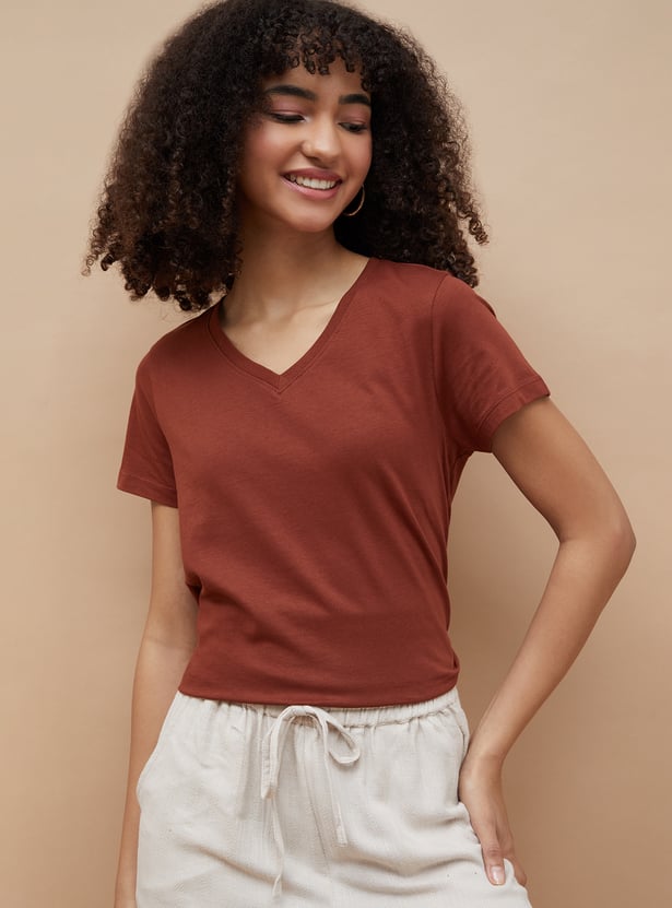 Buy FAME FOREVER Solid V-neck T-shirt from Fame Forever at just INR 299.0