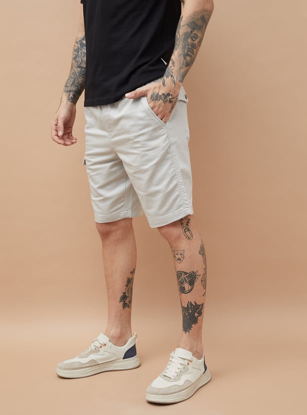 Buy FAME FOREVER Solid Cargo Shorts from Fame Forever at just INR 1499.0