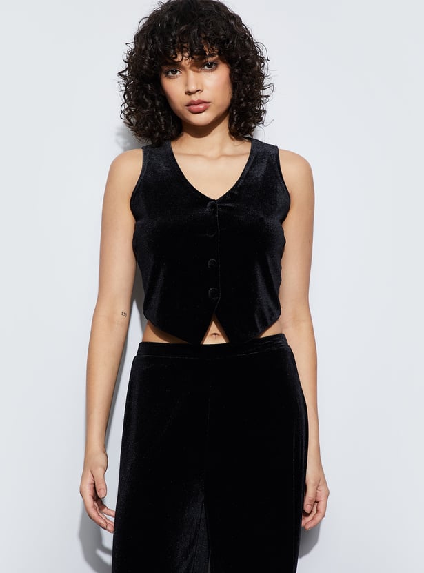 Buy GINGER Solid Sleeveless Crop Top from Ginger at just INR 1299.0