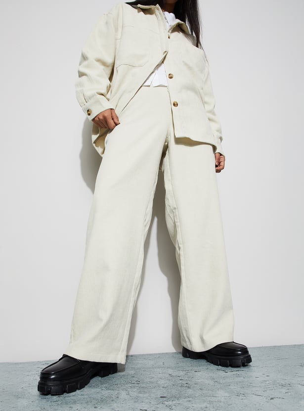 Buy GINGER Corduroy Wide Leg Trousers from Ginger at just INR 1499.0