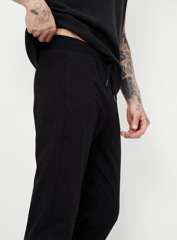 Buy Men Solid Slim Fit Track Pants Online at just Rs. 599.0 ...