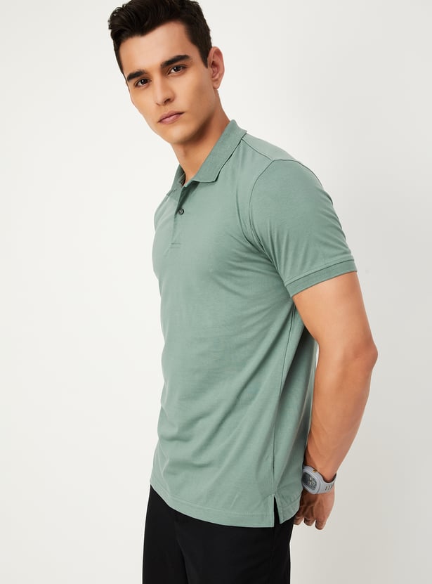 Buy Men Regular Fit Solid Polo T-shirt Online at just Rs. 599.0 ...