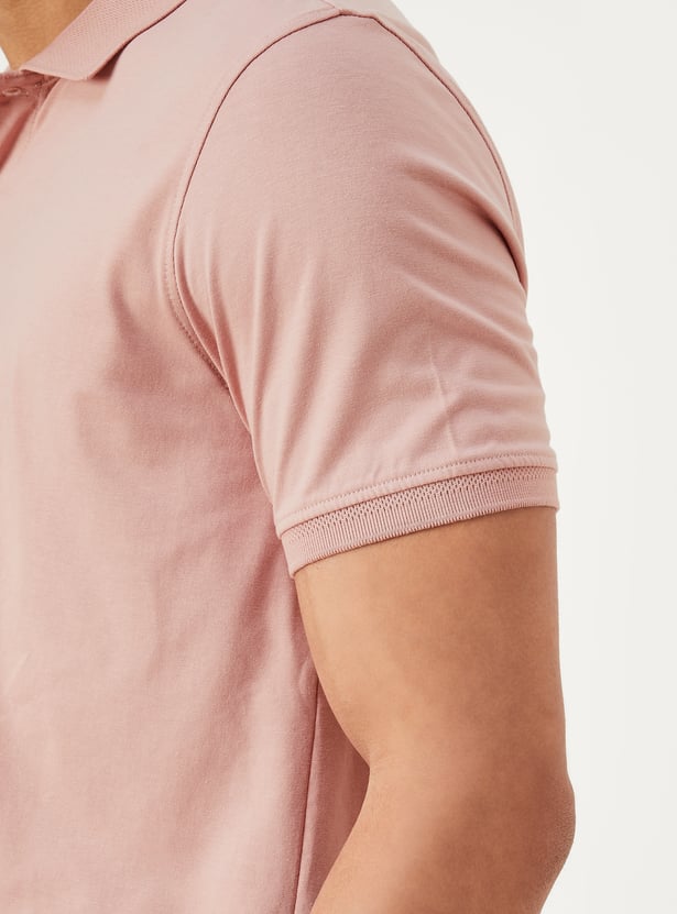 Buy Men Regular Fit Solid Polo T-shirt Online at just Rs. 599.0 ...