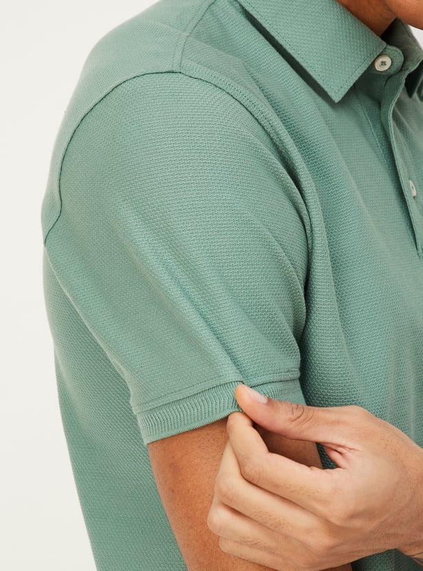 Buy Men Slim Fit Textured Polo T-shirt Online at just Rs. 699.0 ...