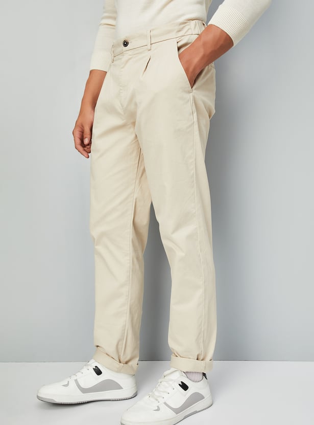 Buy Men Straight Fit Solid Flexi Waist Chinos Online at just Rs. 1199.0 ...