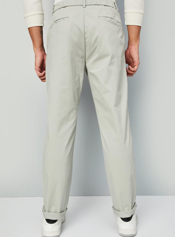 Buy Men Straight Fit Solid Flexi Waist Chinos Online at just Rs. 1199.0 ...
